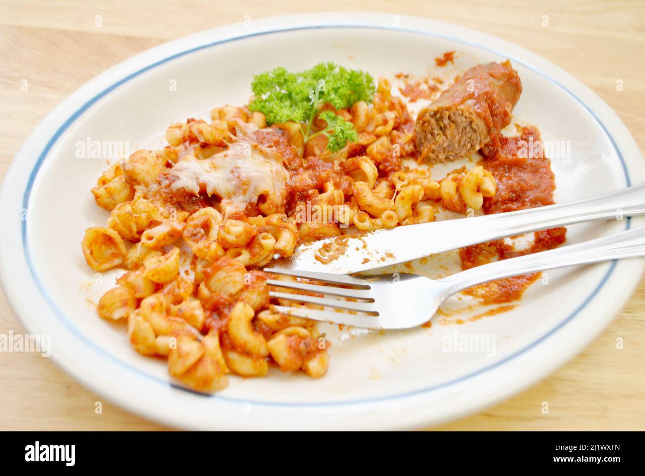 Food Left on a Plate After a Pasta Dinner Stock Photo - Alamy