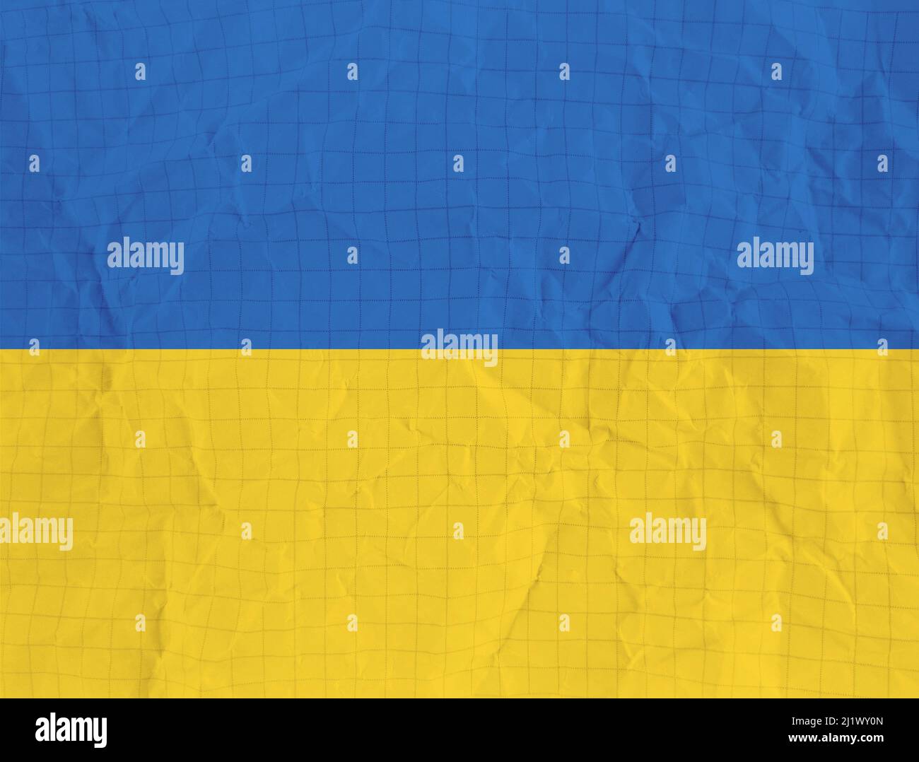 Ukrainian flag colors background. Crumpled sectional paper sheet ...