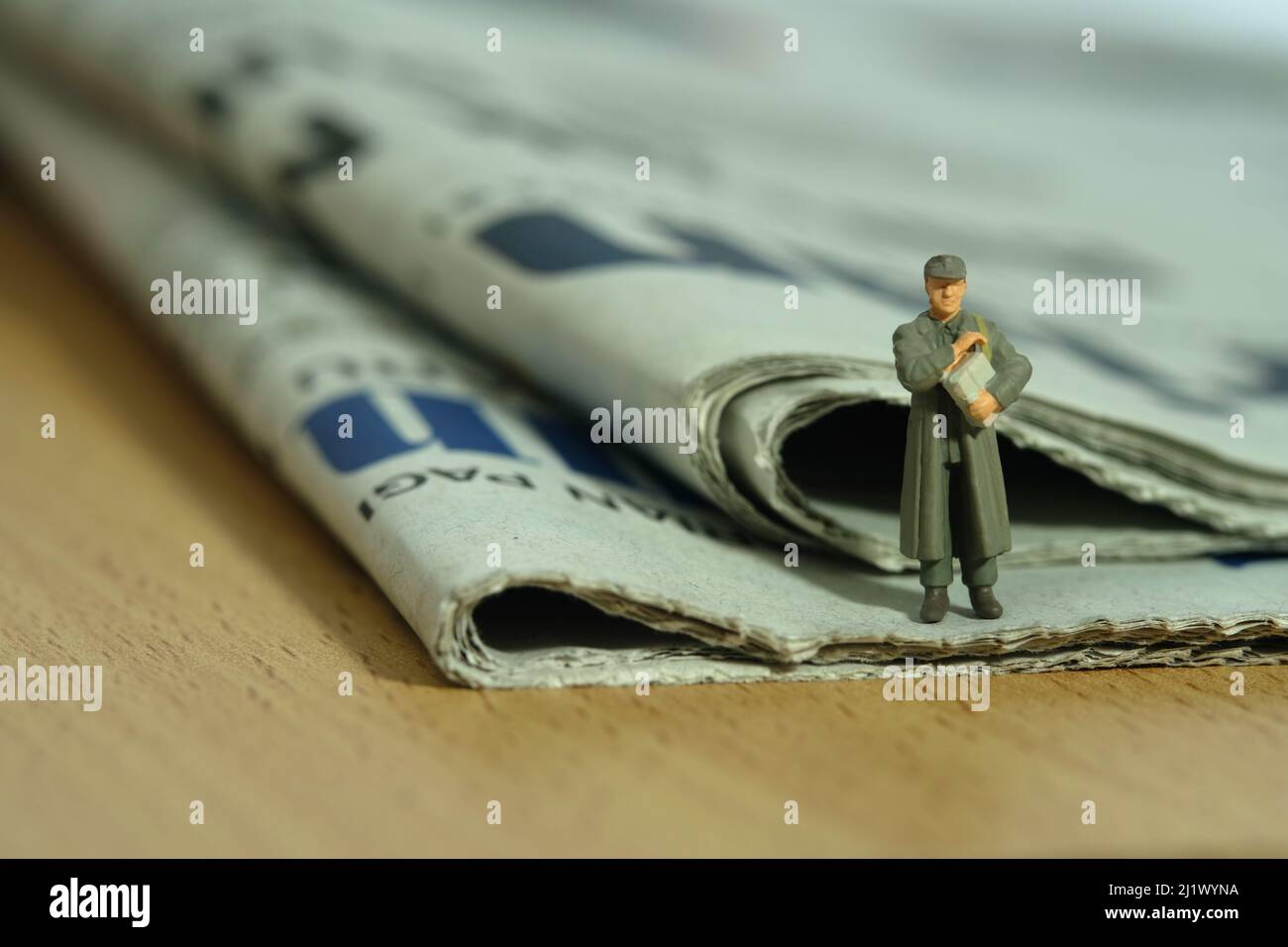 Miniature people toy figure photography. A military mail officer ...