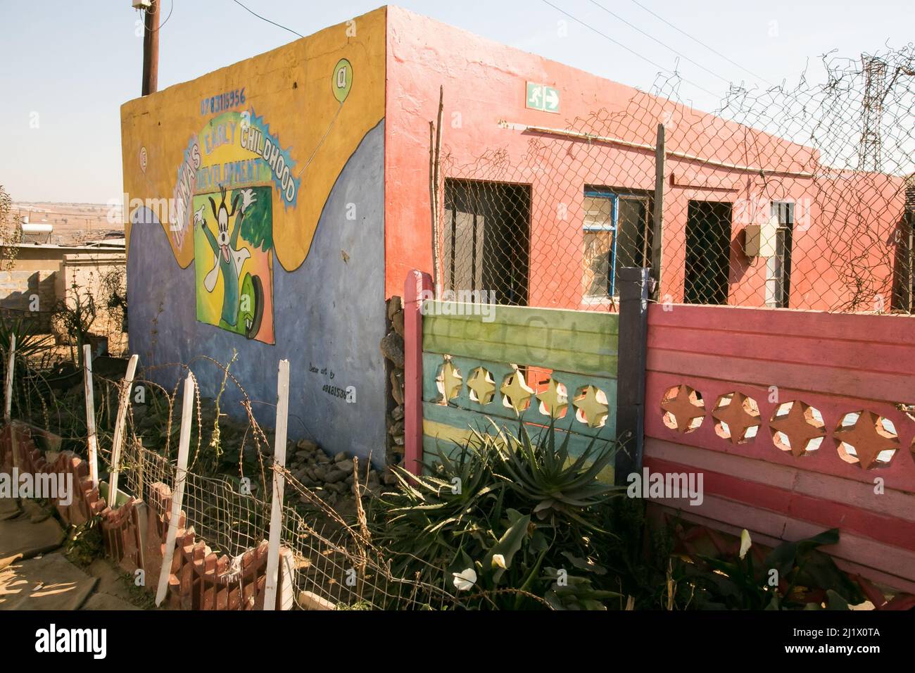 Johannesburg, South Africa - August 6, 2015: Exterior of small township ...