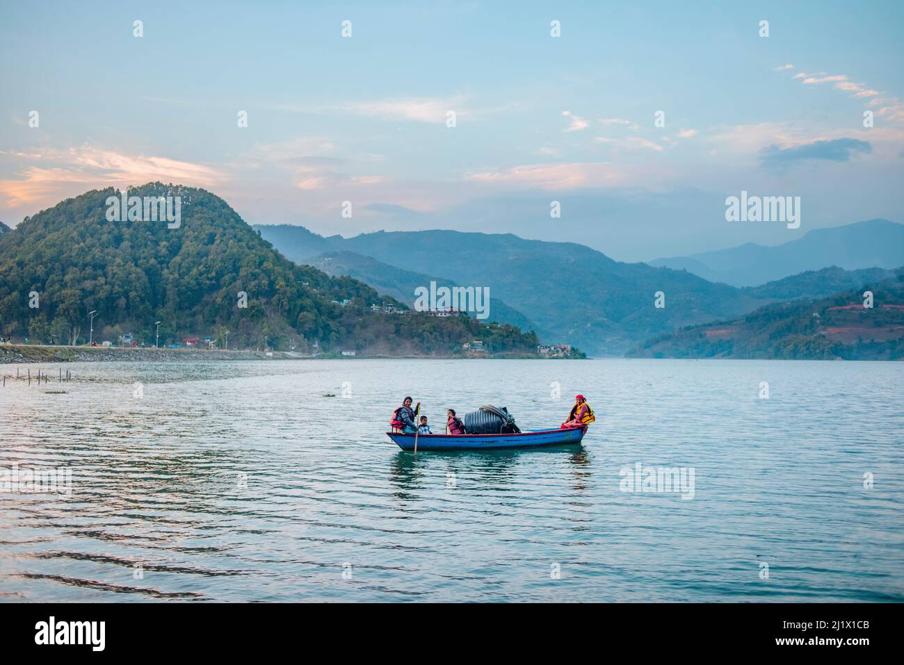 Boats at Begnas lake, Pokhara, Nepal Stock Photo - Alamy