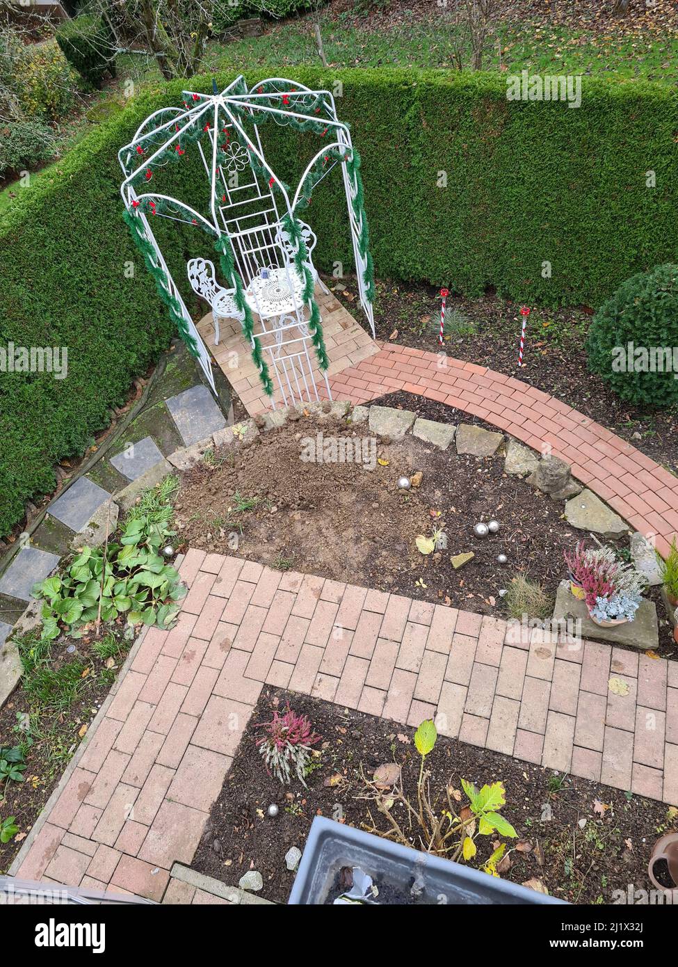 Worker laying pavement rocks Stock Photo - Alamy