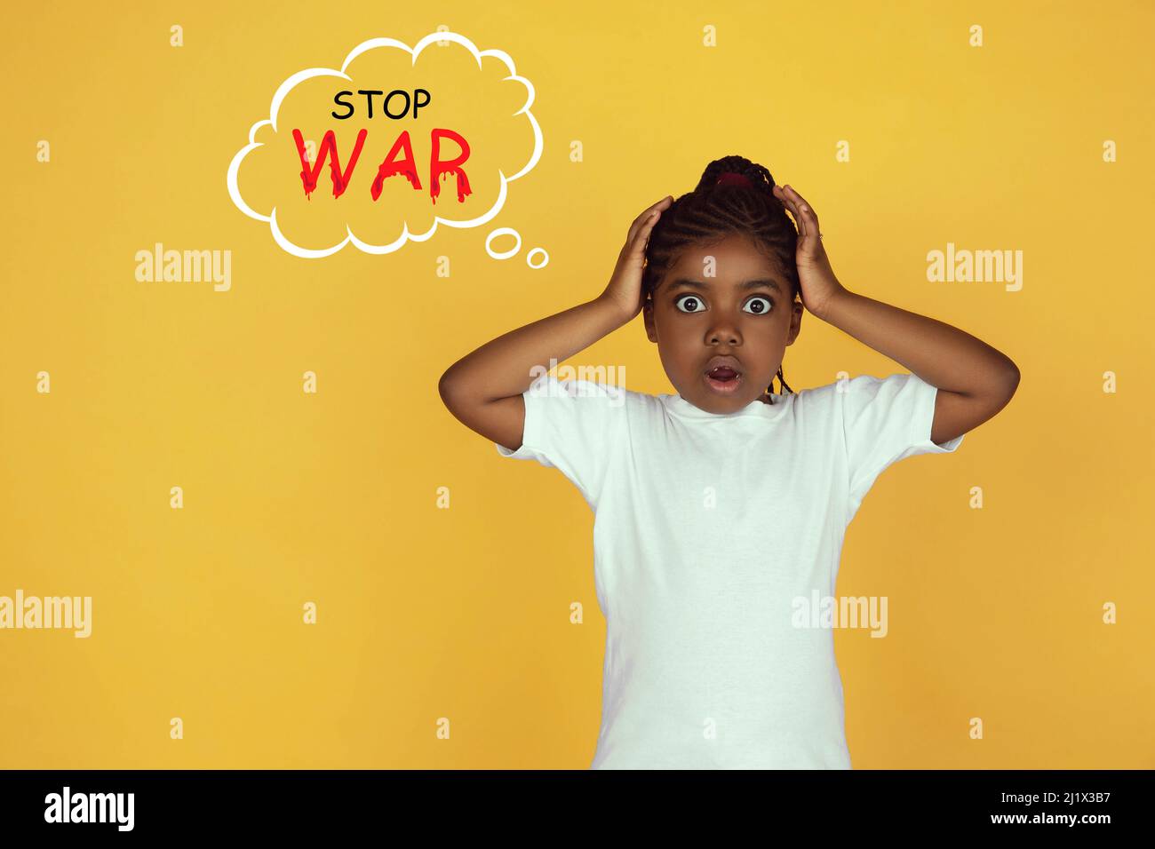 Portrait of little african girl with shocked and scary facial ...