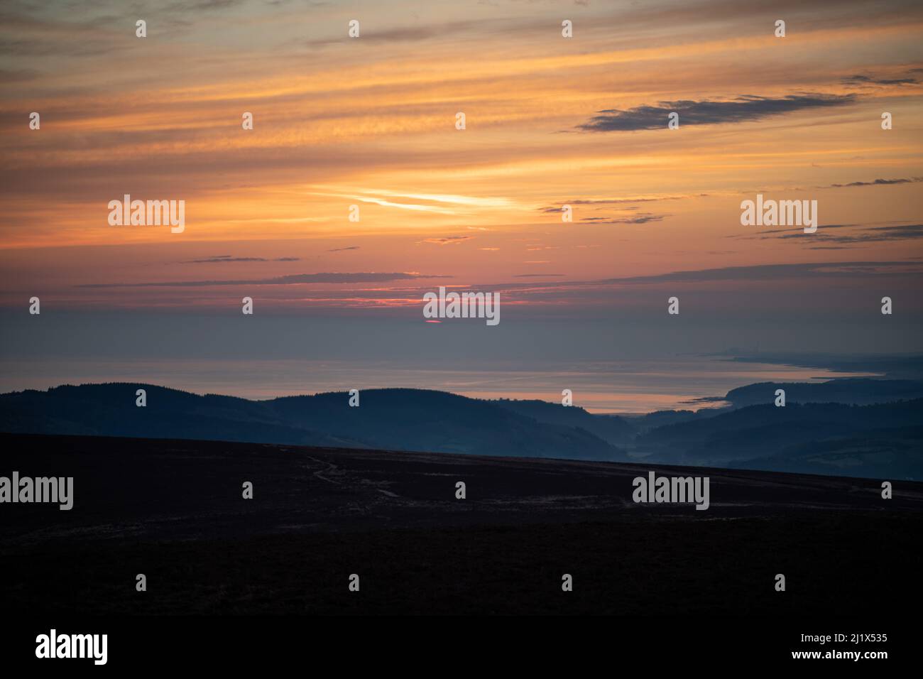 A mesmerizing view of a sunset above the horizon Stock Photo - Alamy