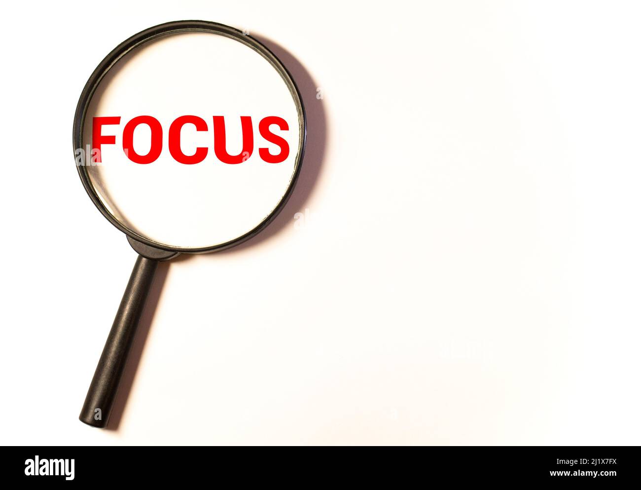 Focus word through a magnifying glass. Magnifying glass search concept ...