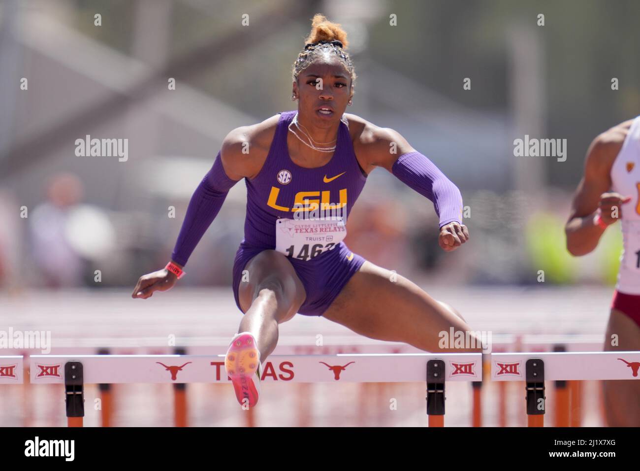 Alia Armstrong of LSU wins the women's 100m hurdles in a wind-aided 12. ...