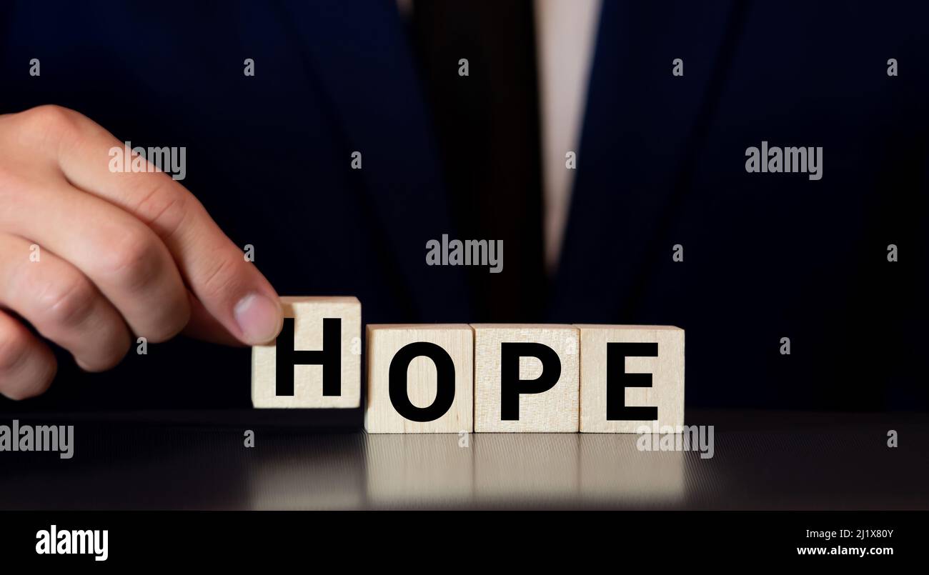 Hope word concept, word written on wood block Stock Photo - Alamy