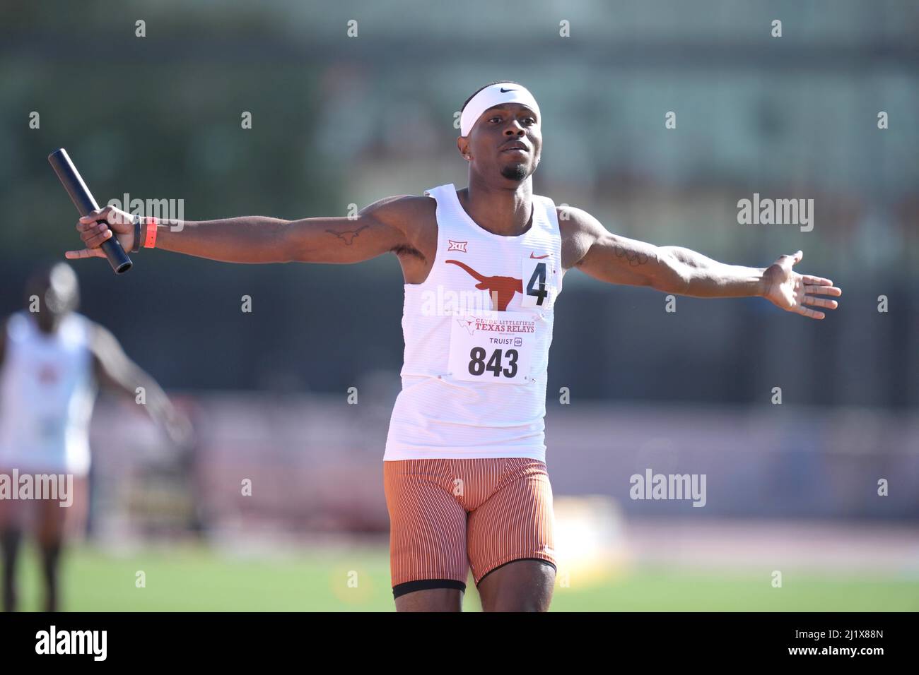 Jonathan Jones celebrates after running the anchor leg on the Texas ...