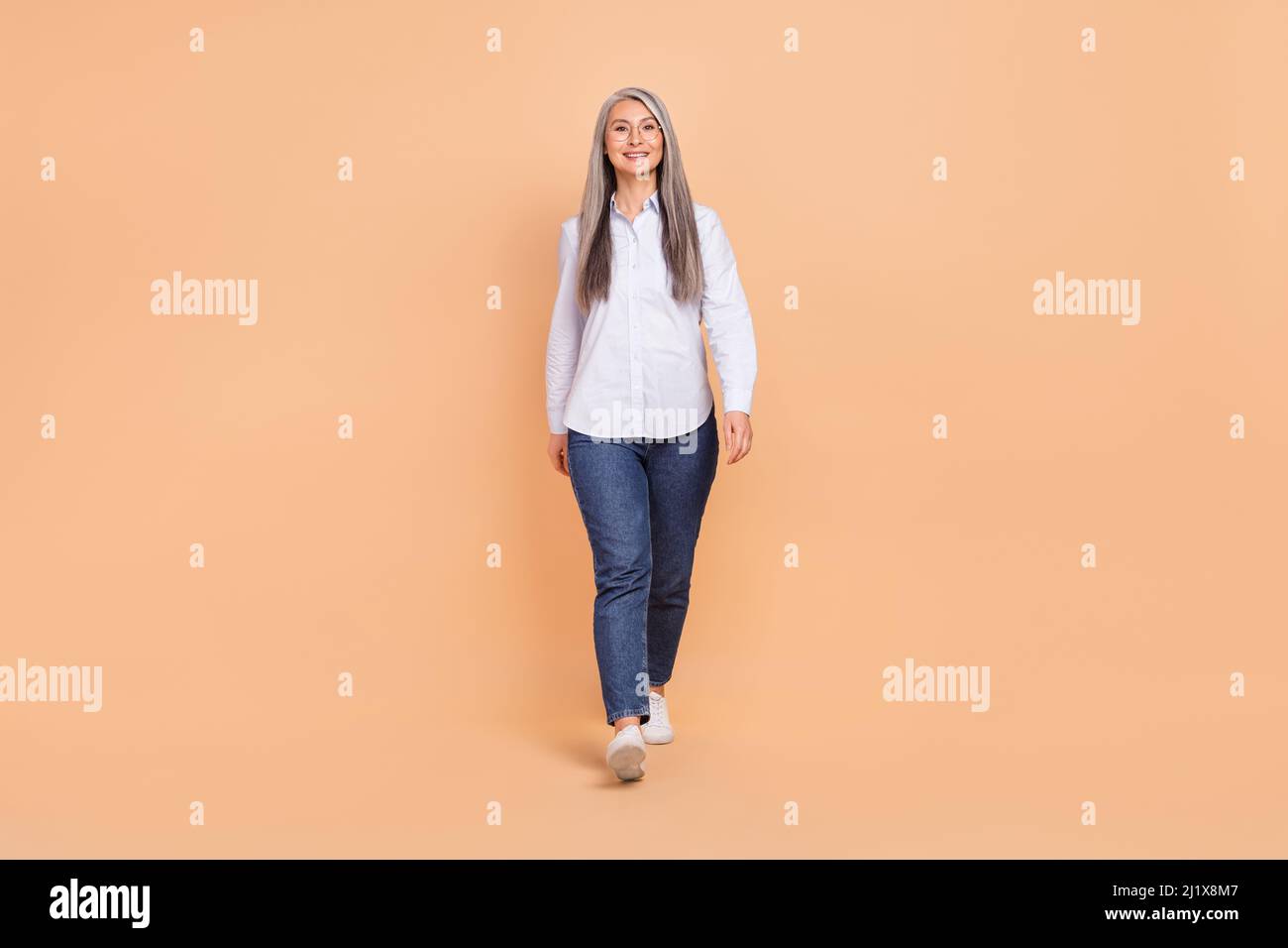 Full body photo of cheerful pretty woman chief leader go smart casual ...