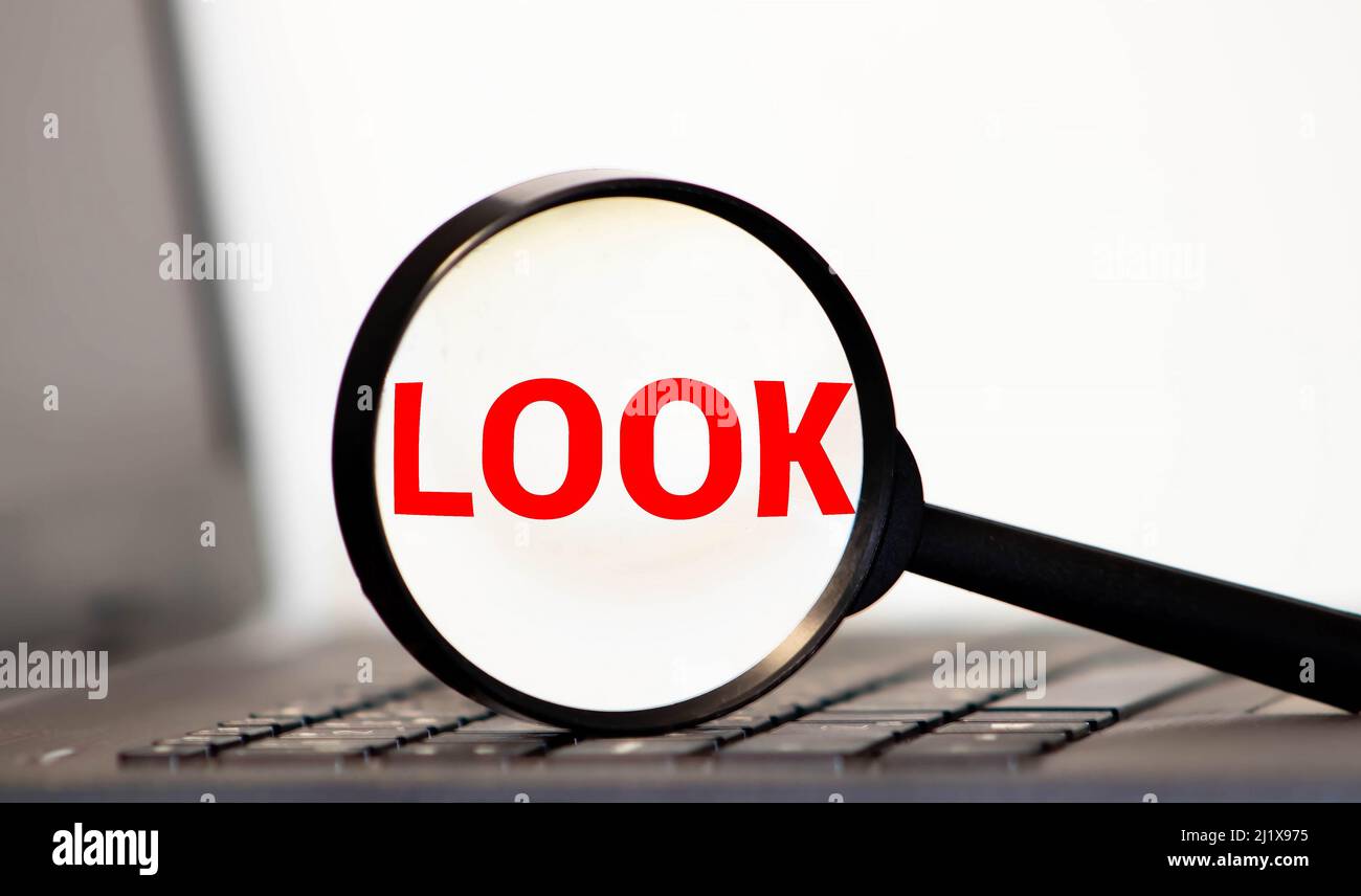 Black white letters sign board with the word look spelled out in ...