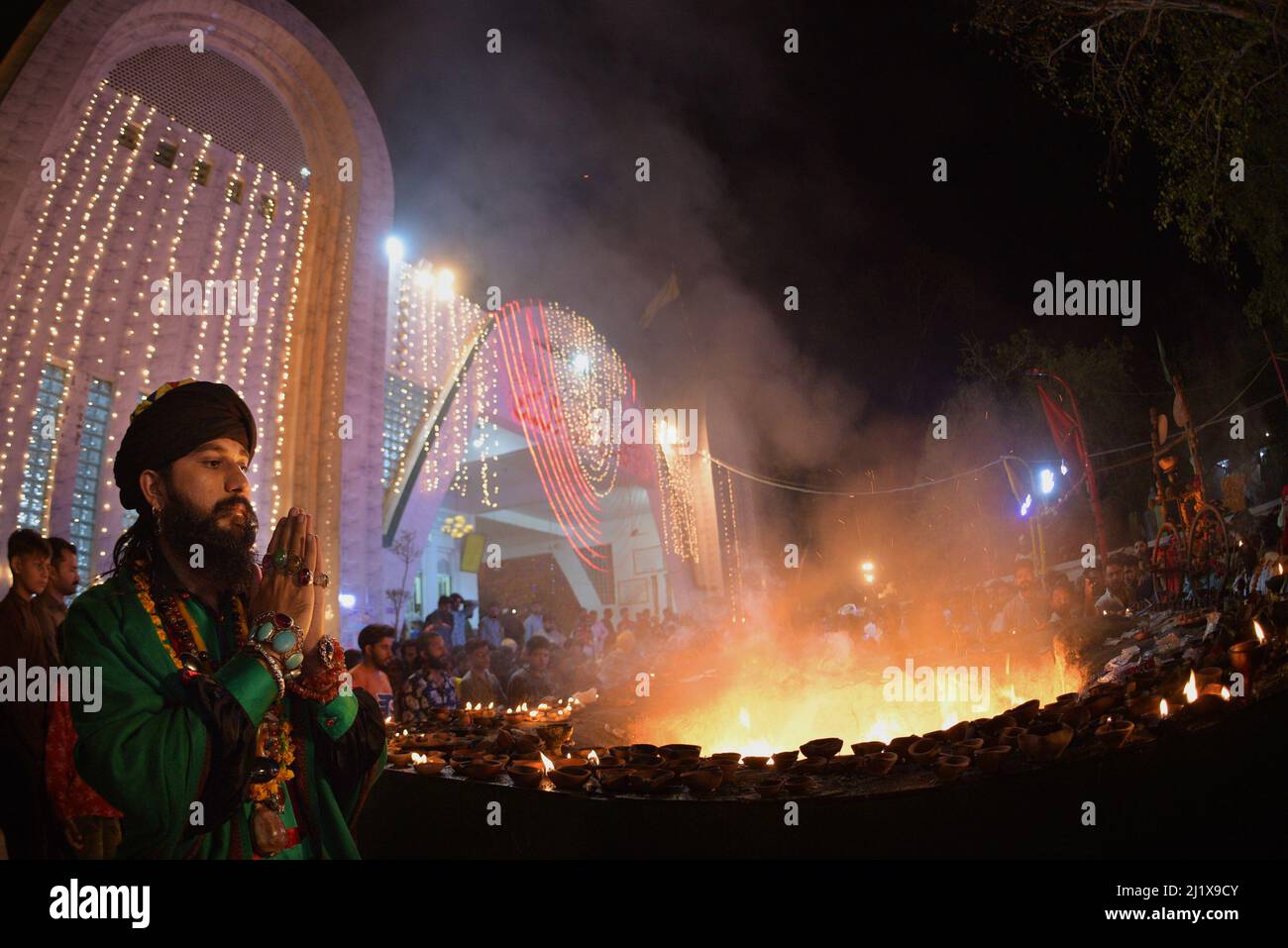 Pakistani devotees attend the three-days 434th annual Urs 'Festival of lights' at the shrine of ...