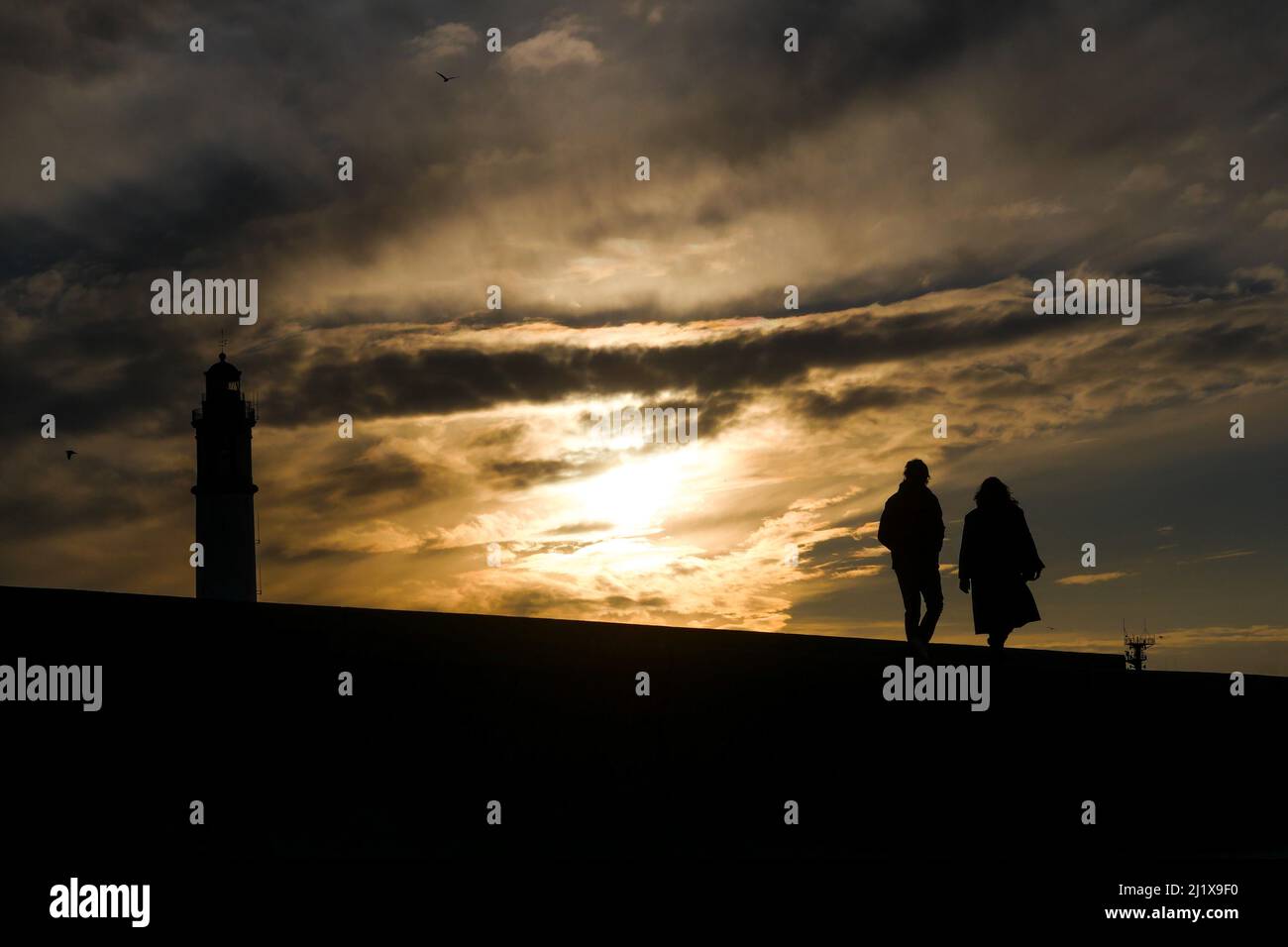 Rear man walking on jetty hi-res stock photography and images - Alamy