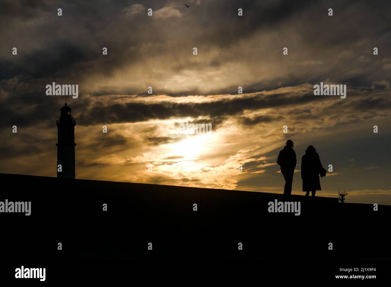 Rear man walking on jetty hi-res stock photography and images - Alamy
