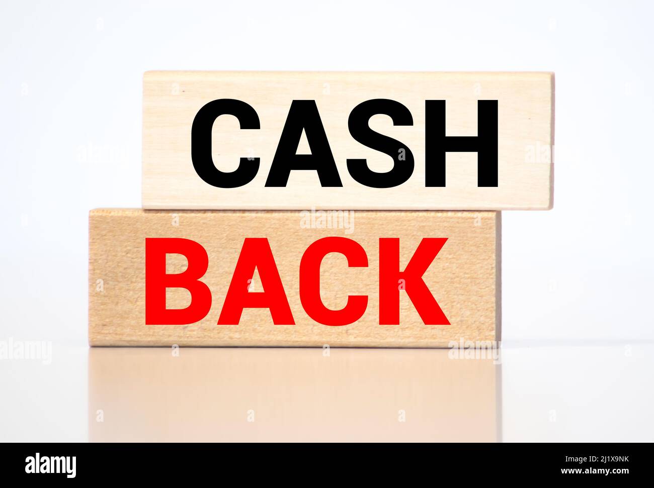 Letter block in word cash back on wood background Stock Photo - Alamy