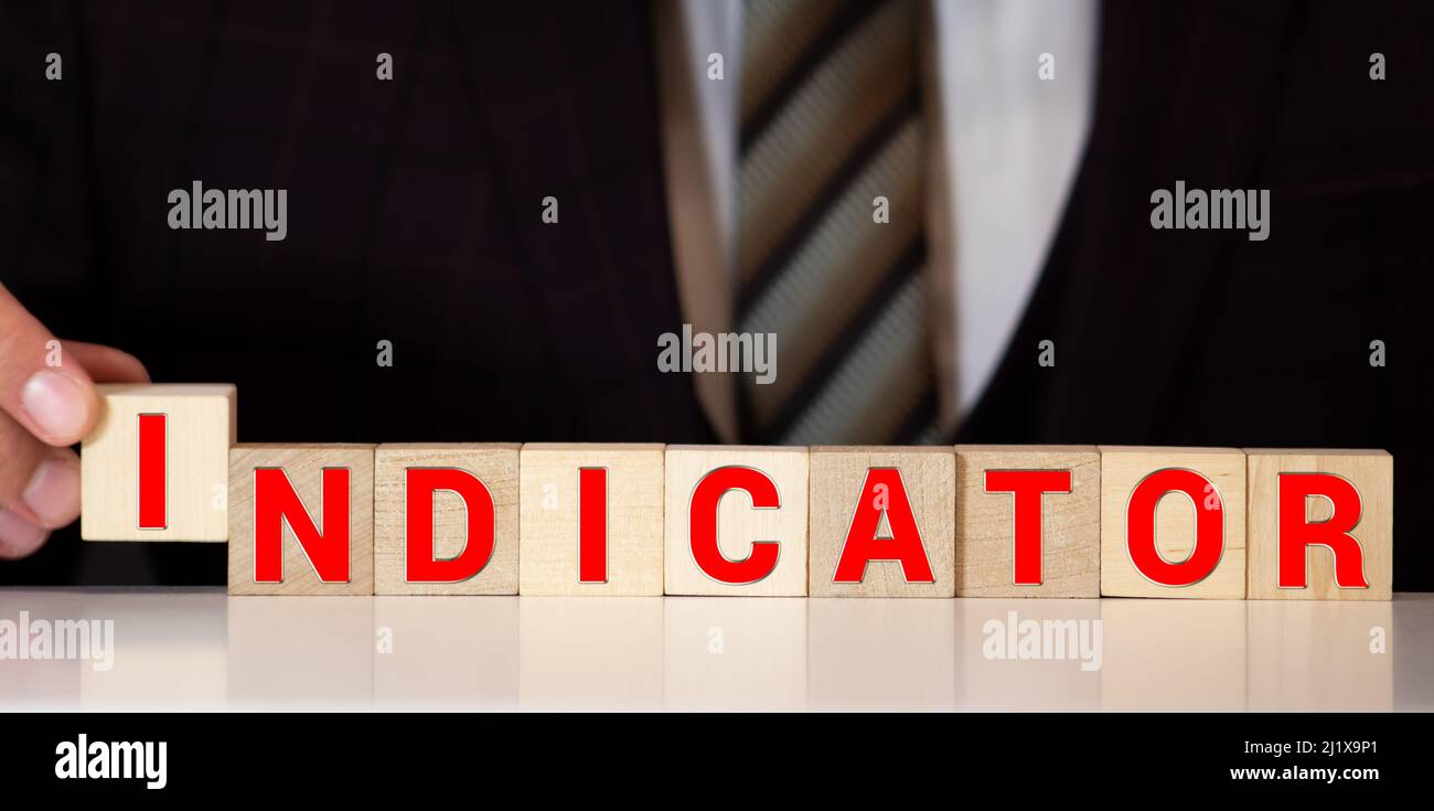 Indicator word from wooden blocks. Business and banking concept. Spot ...
