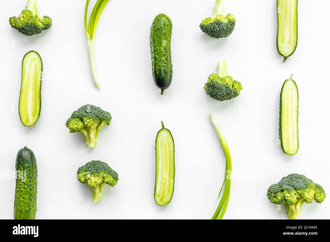 Pattern of green vegetables with broccoli and cucumber. Food background ...