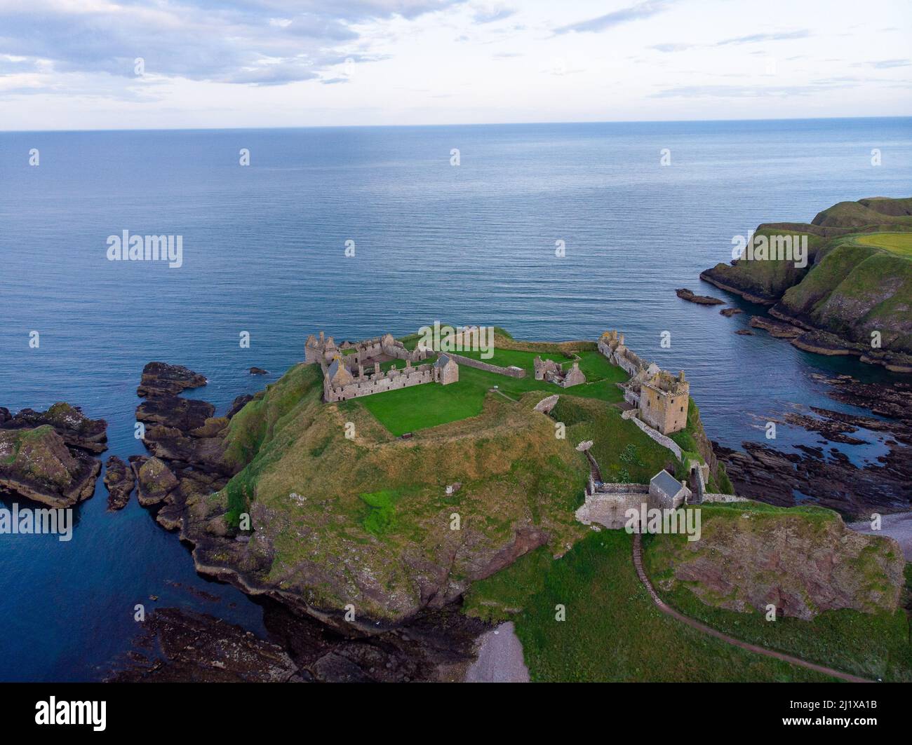 An aerial view of Dunnottar Castle on a hill in England Stock Photo - Alamy