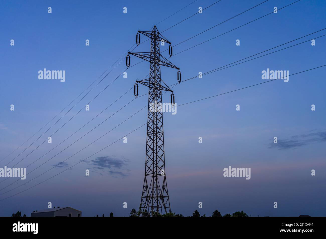 Detail of electric pole with electric cables at sunset Stock Photo - Alamy