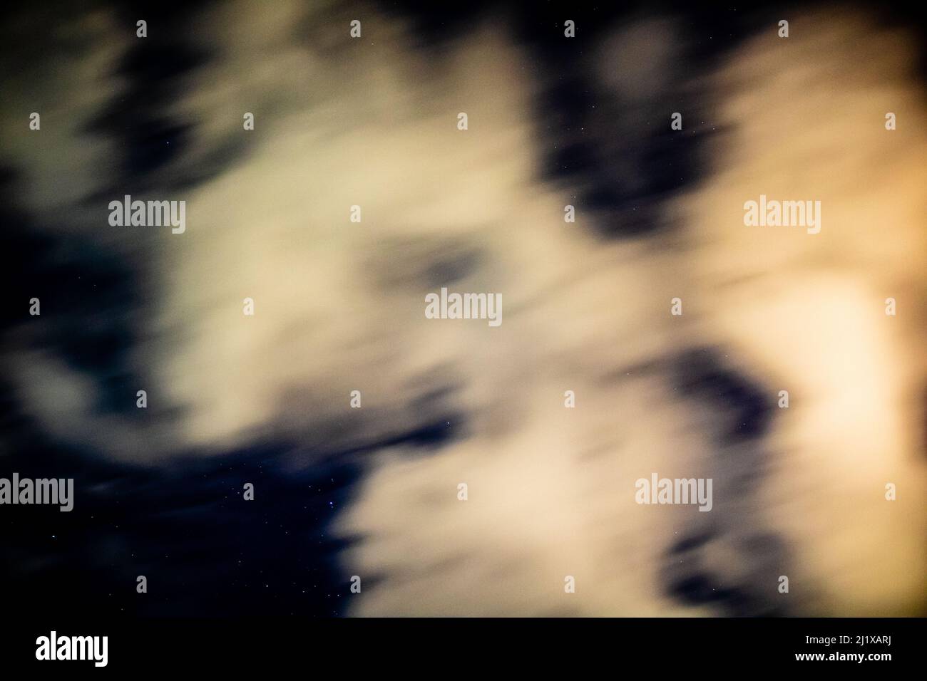Stars in space, real photography with moving clouds Stock Photo - Alamy