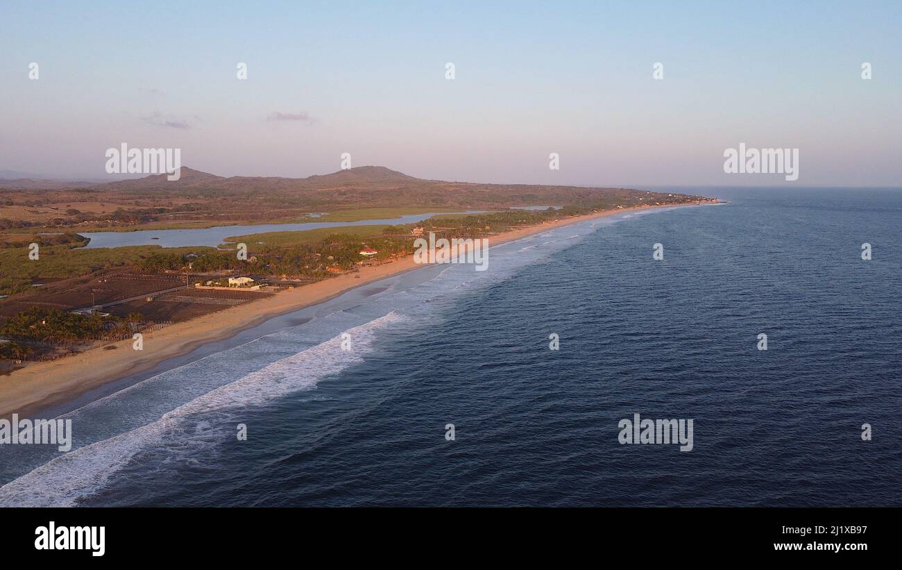 An aerial view of a beautiful shoreline during summertime Stock Photo ...