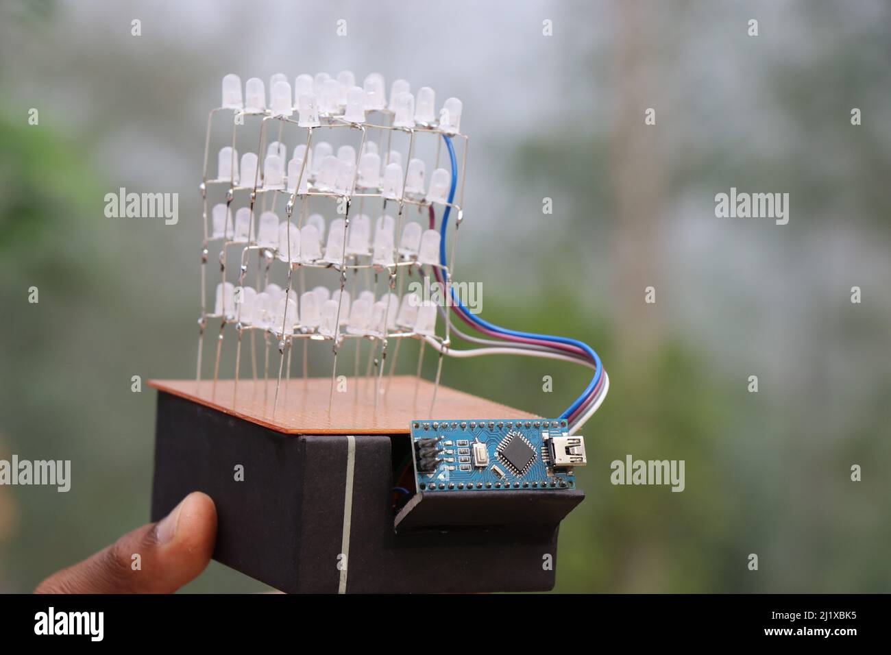 LED cube light which is an awesome electronic project held in hand ...