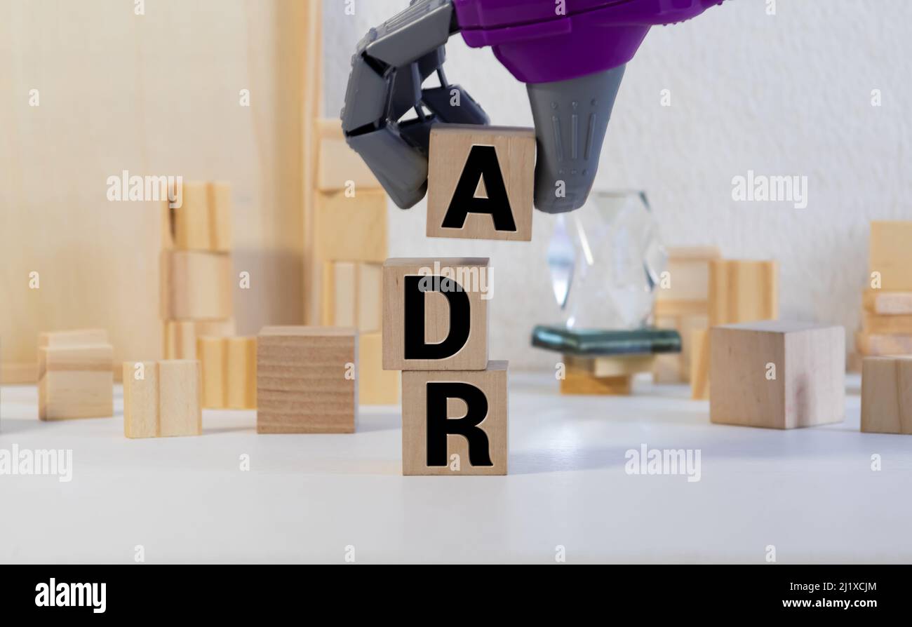 Letter block in word ADR on wood background Stock Photo - Alamy