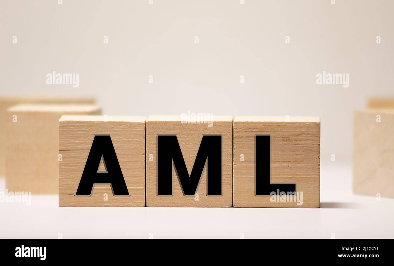 AML anti money laundering acronym on wooden blocks. Government policy ...