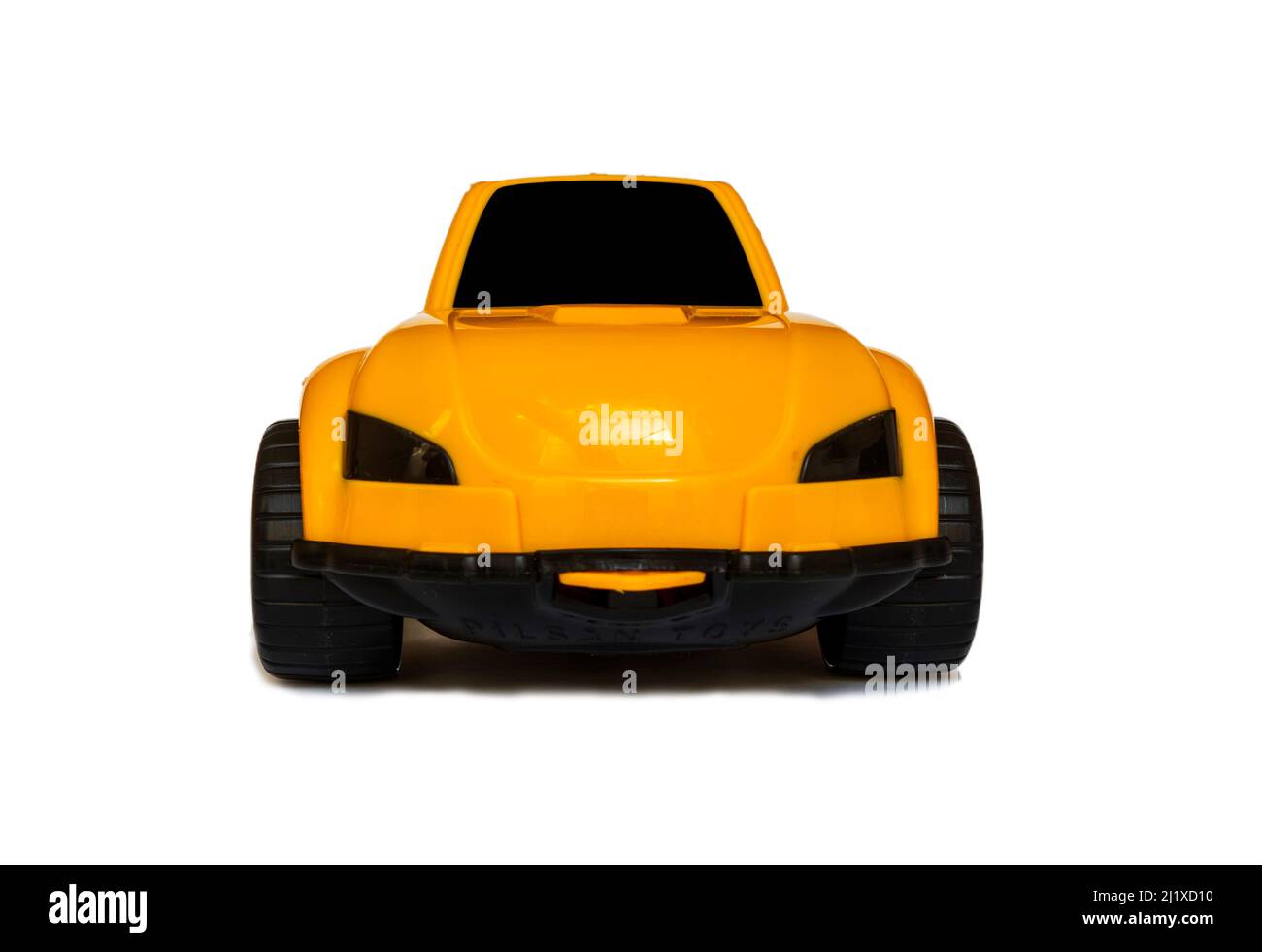 Children's yellow plastic toy car on a white background Stock Photo - Alamy