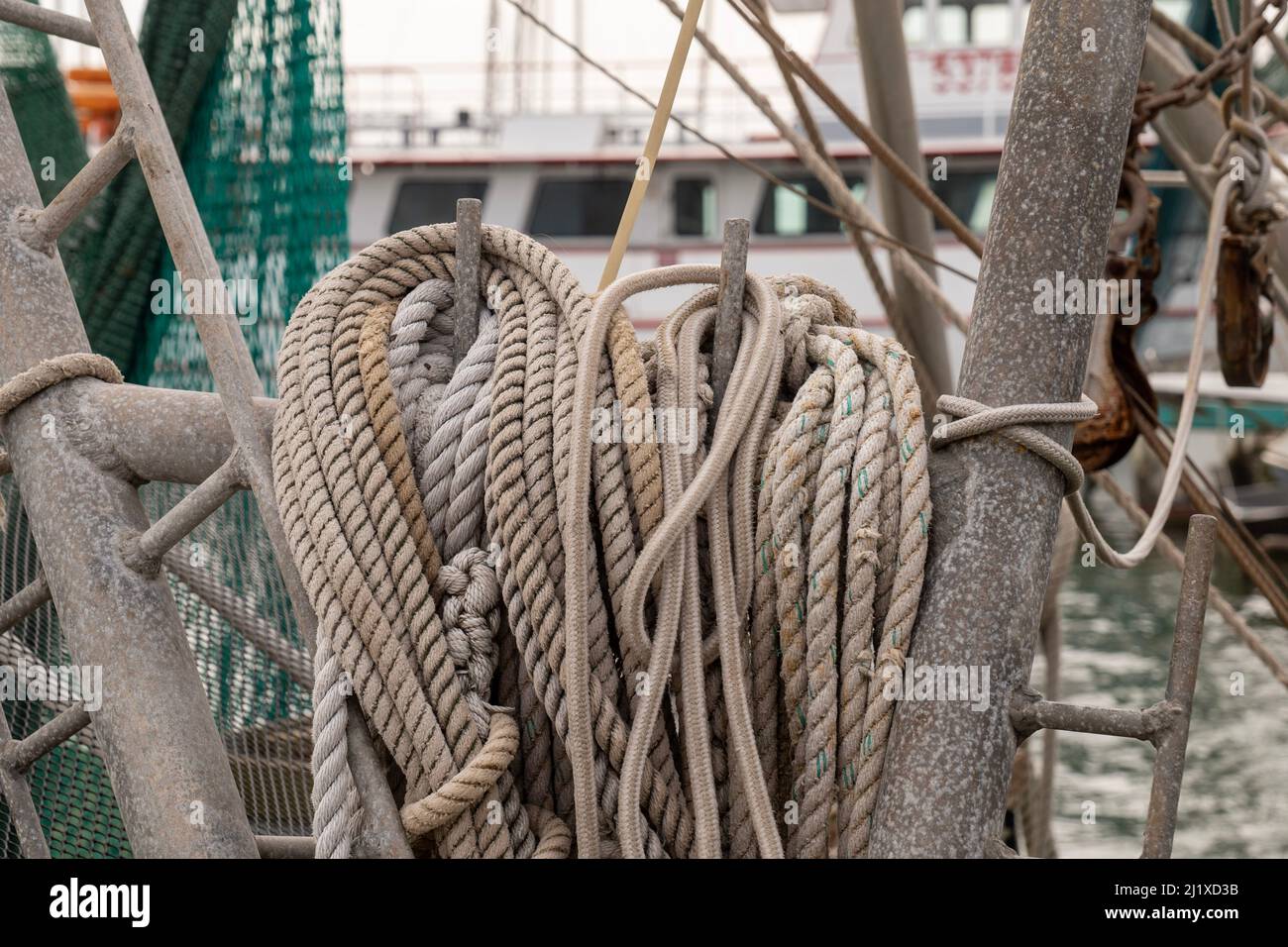 Various nautical ropes ready for use on deck of a commercial fishing ...