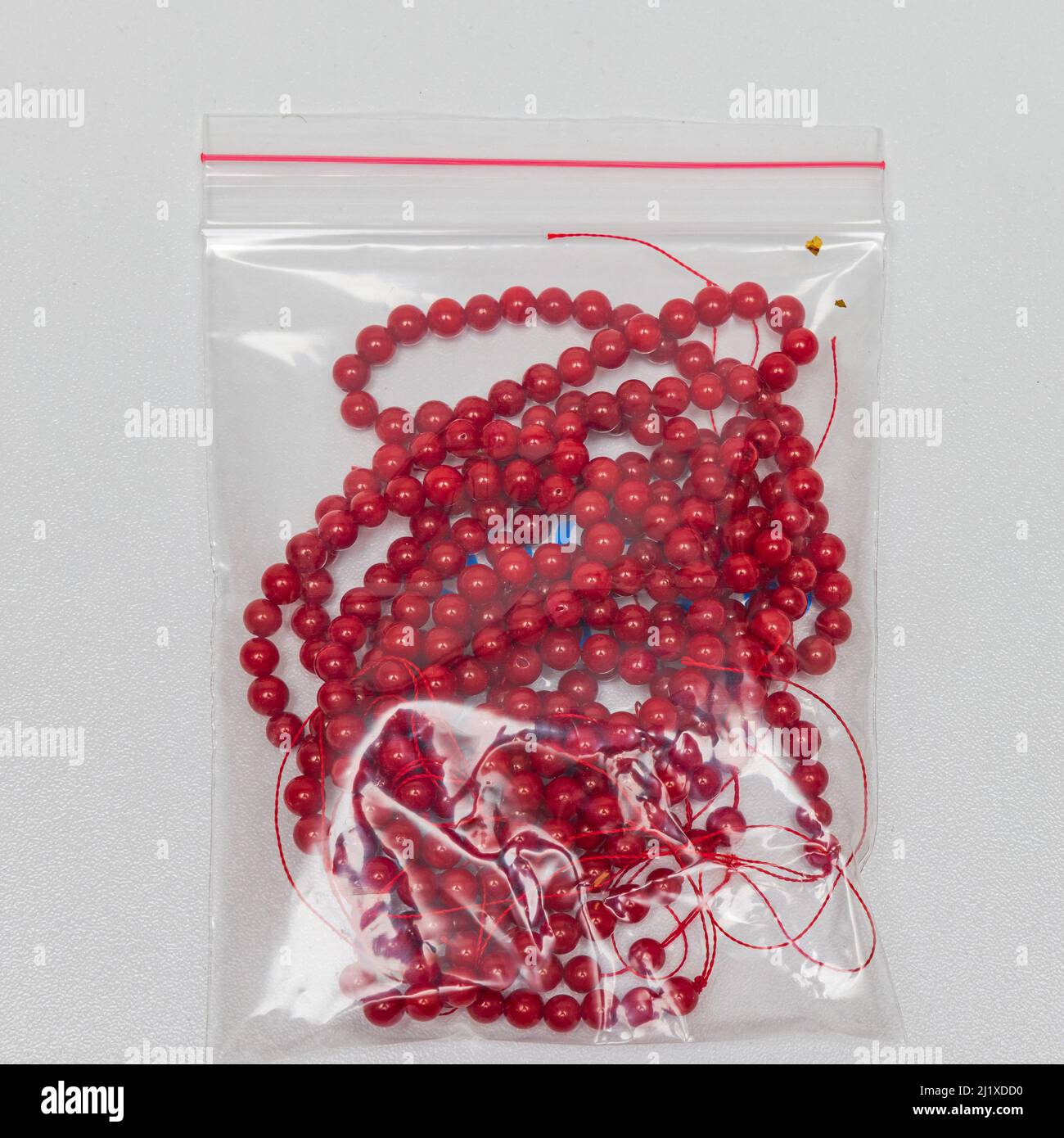 Red Pearls Necklaces Jewellery Craft Material in Bag Stock Photo - Alamy