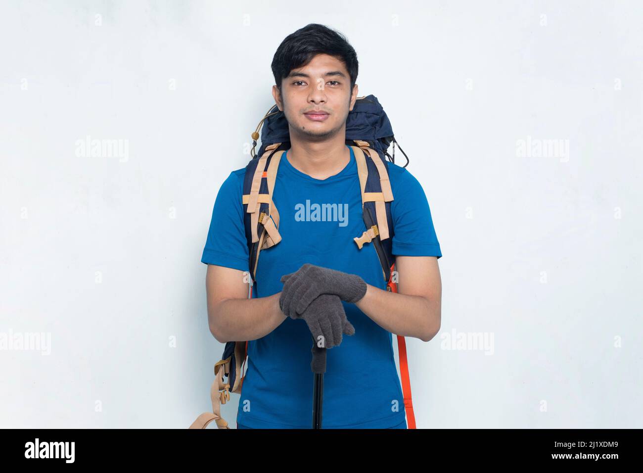 Portrait young handsome asian hiker man with a backpack isolated on ...
