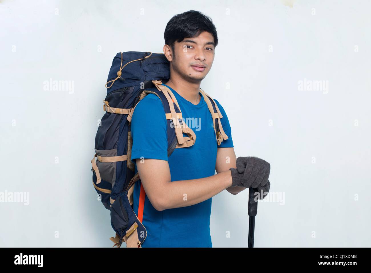 Portrait young handsome asian hiker man with a backpack isolated on ...