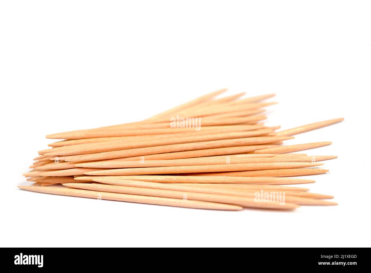 Wooden toothpick against white background Stock Photo - Alamy
