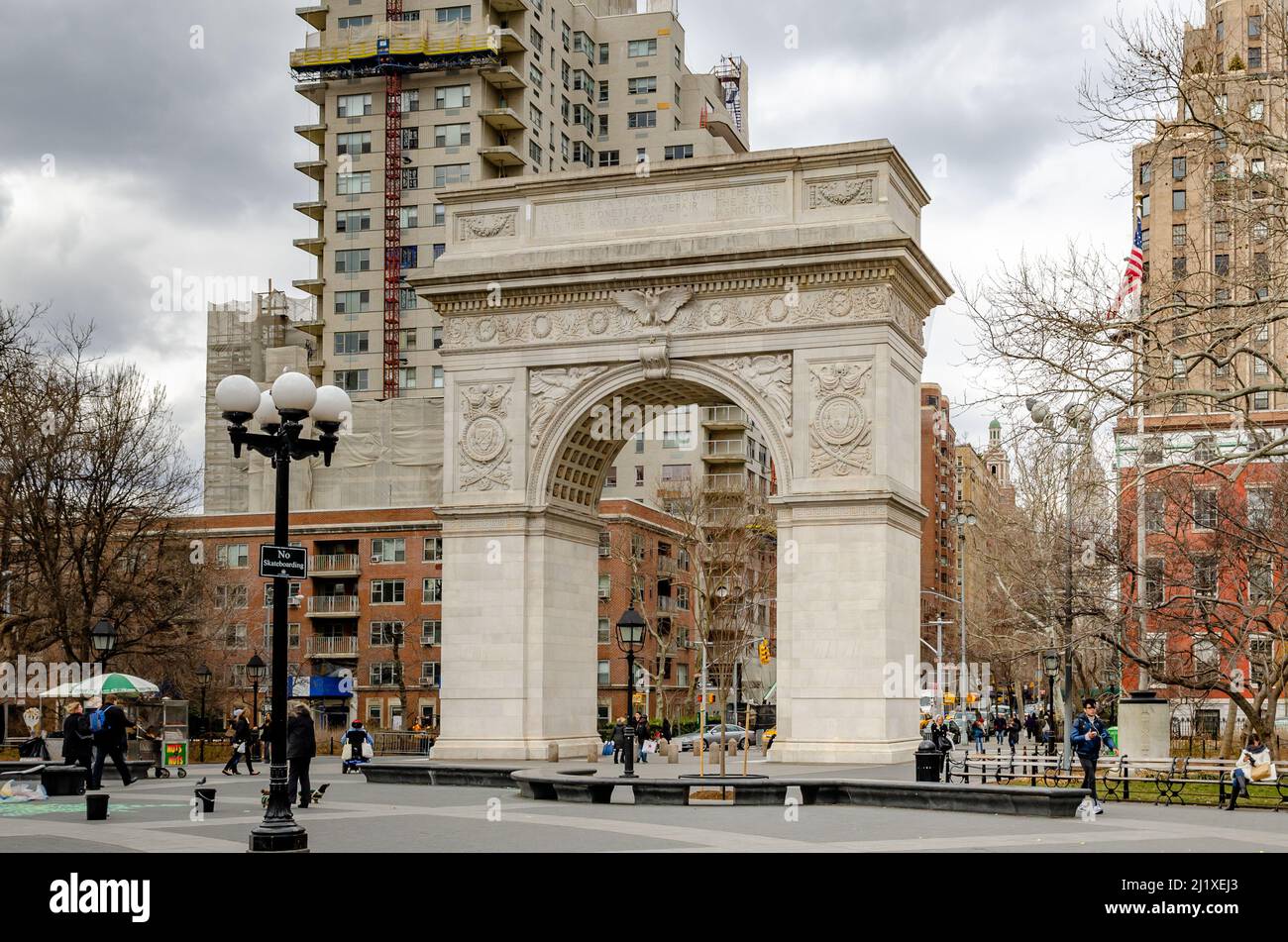 Washington Square Arch, New York City during a cold winter day with few ...