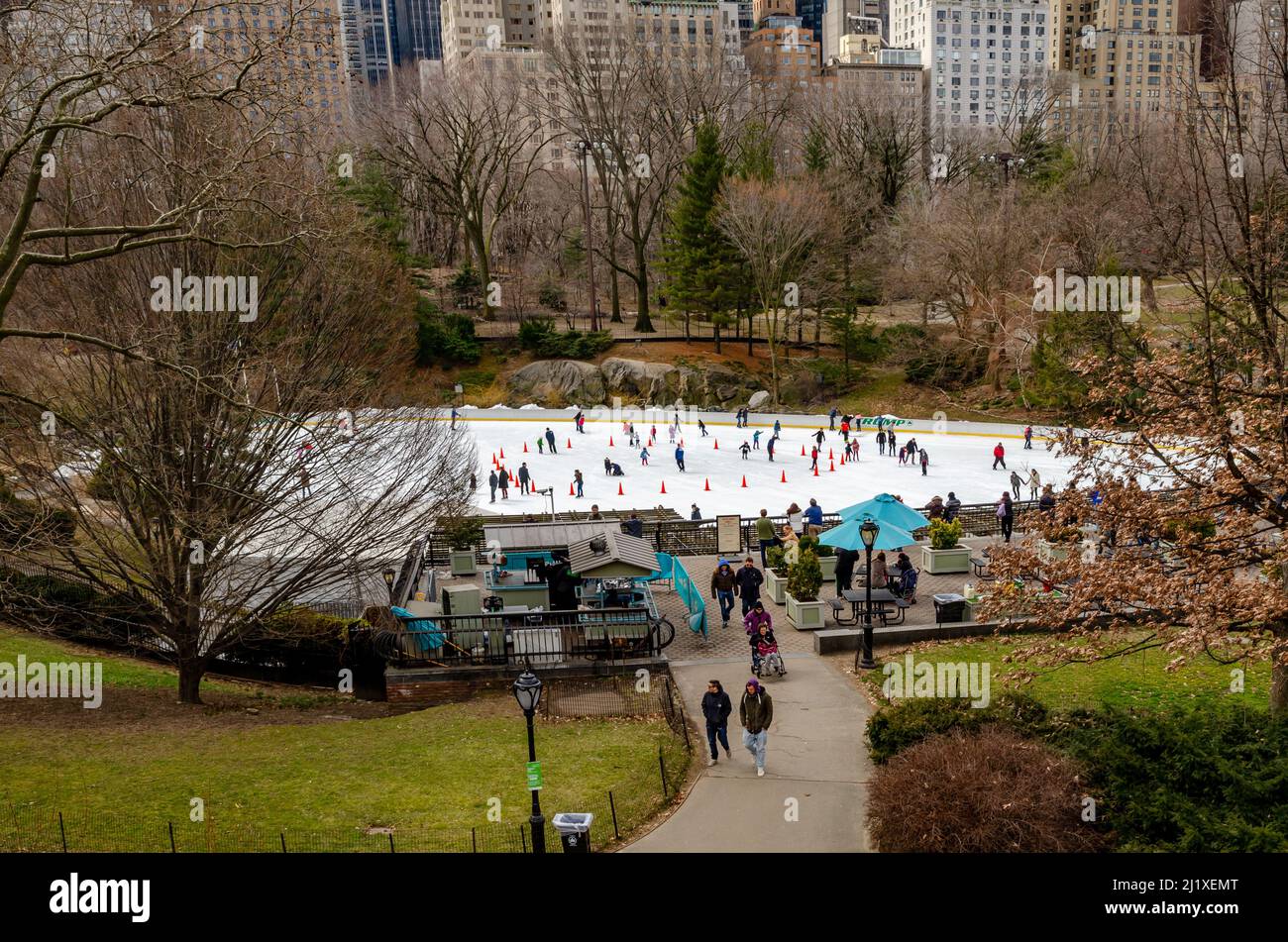 Wollman Rink with People Ice Skating during daytime in winter, view ...