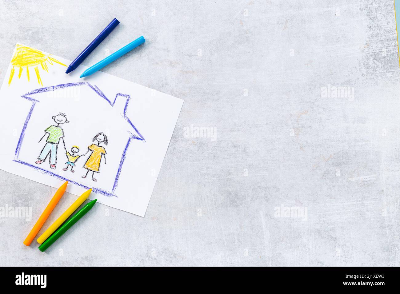 Childs drawing of happy family. Adoption concept Stock Photo - Alamy
