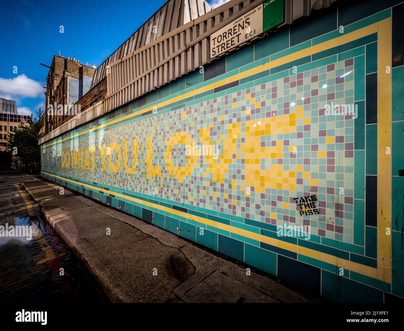 Inspirational tiled message "Do what you love" on the façade of the ...