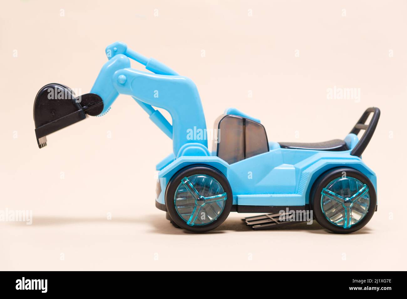 Blue excavator plastic machine on white background. Construction ...