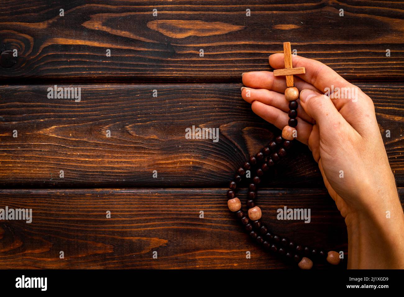 Faith and prayer concept - rosary beads with cross Stock Photo - Alamy