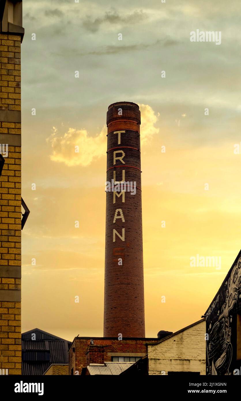 Truman's Brewery chimney seen against a golden sky. London. UK Stock ...