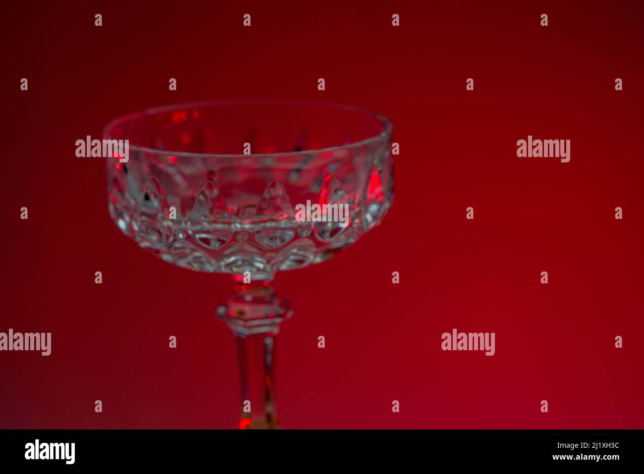 Glass lit from below with colored light creates consuming patterns to ...