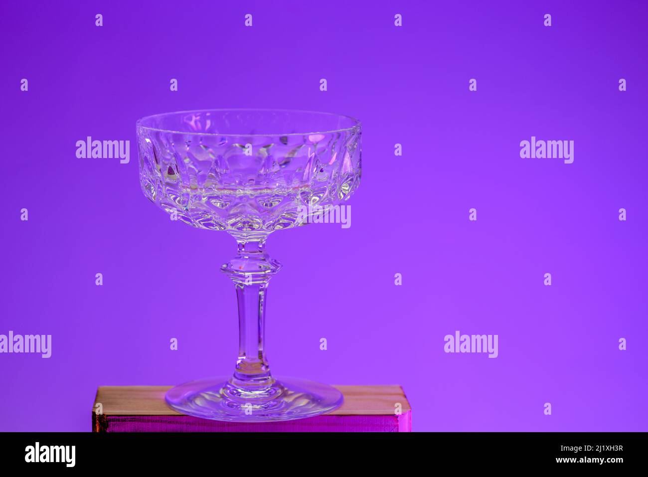 Glass lit from below with colored light creates consuming patterns to ...