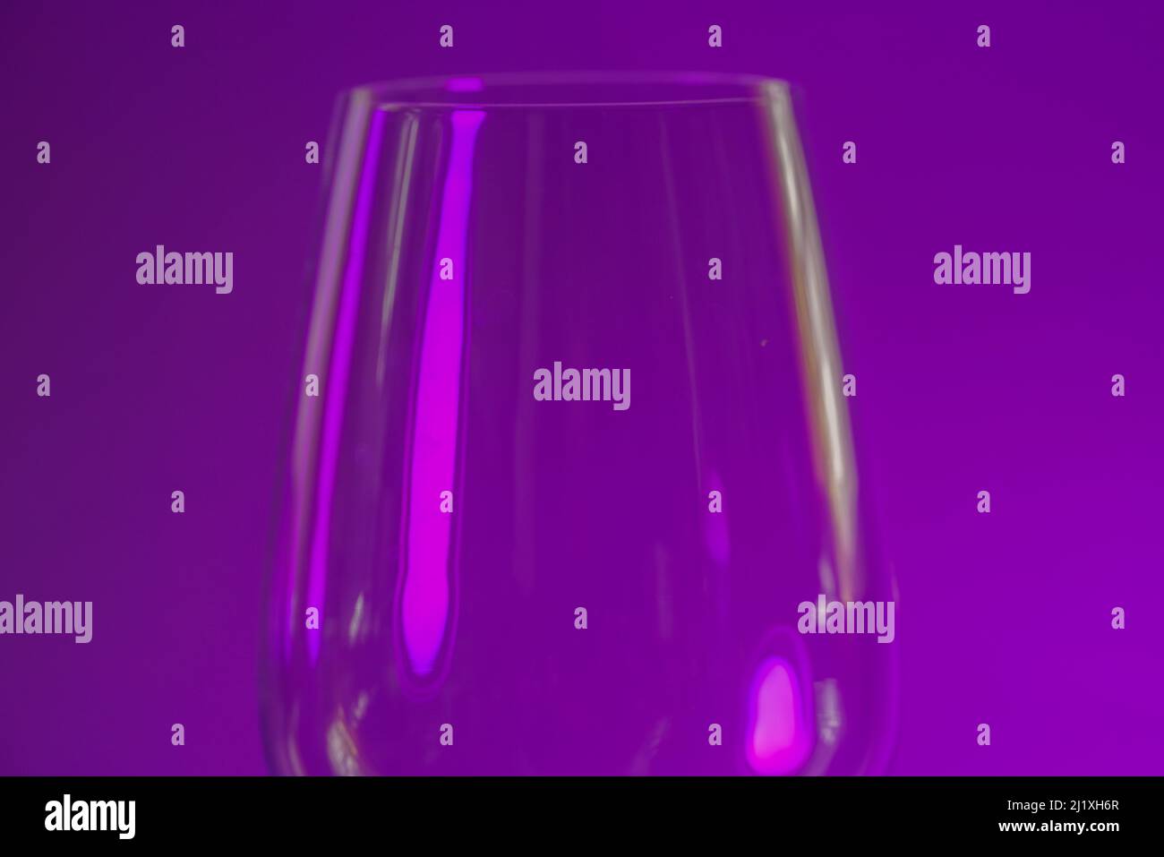 Glass lit from below with colored light creates consuming patterns to ...