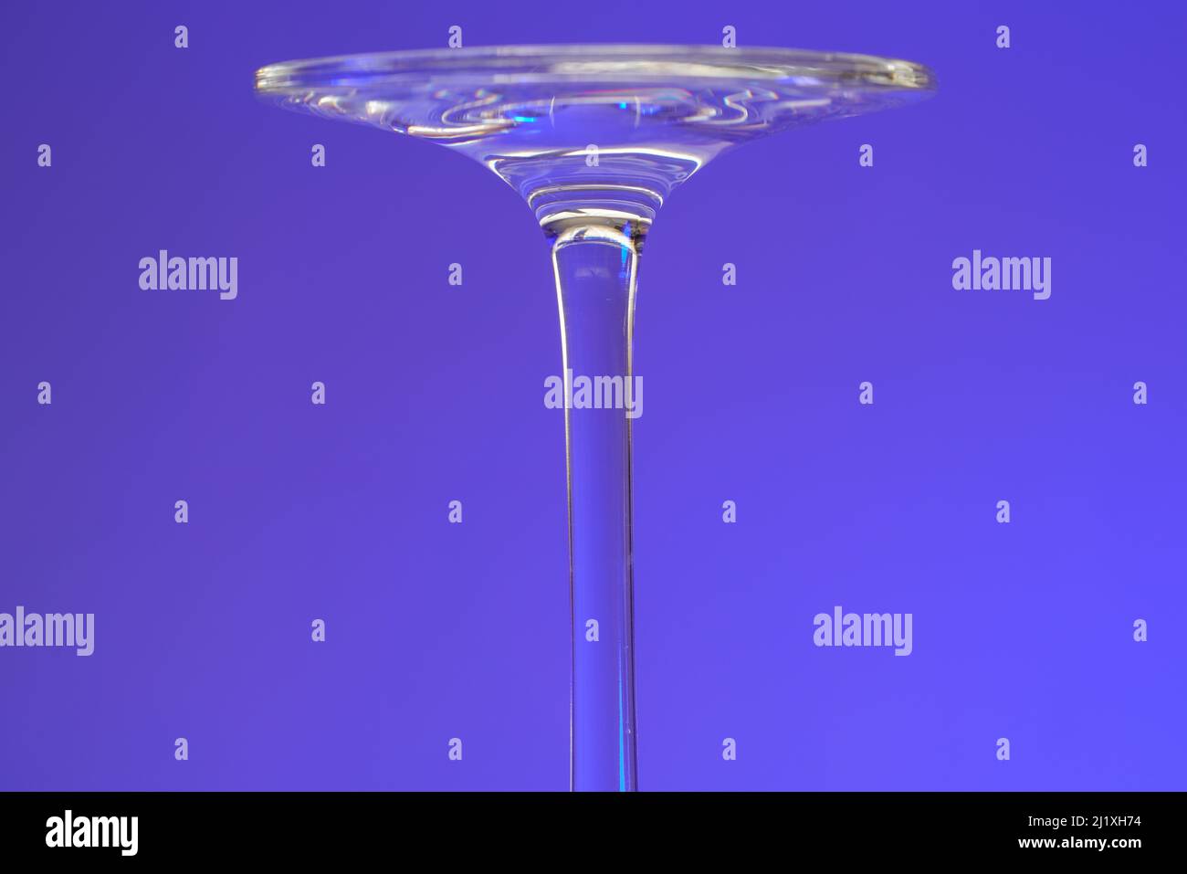 Glass lit from below with colored light creates consuming patterns to ...