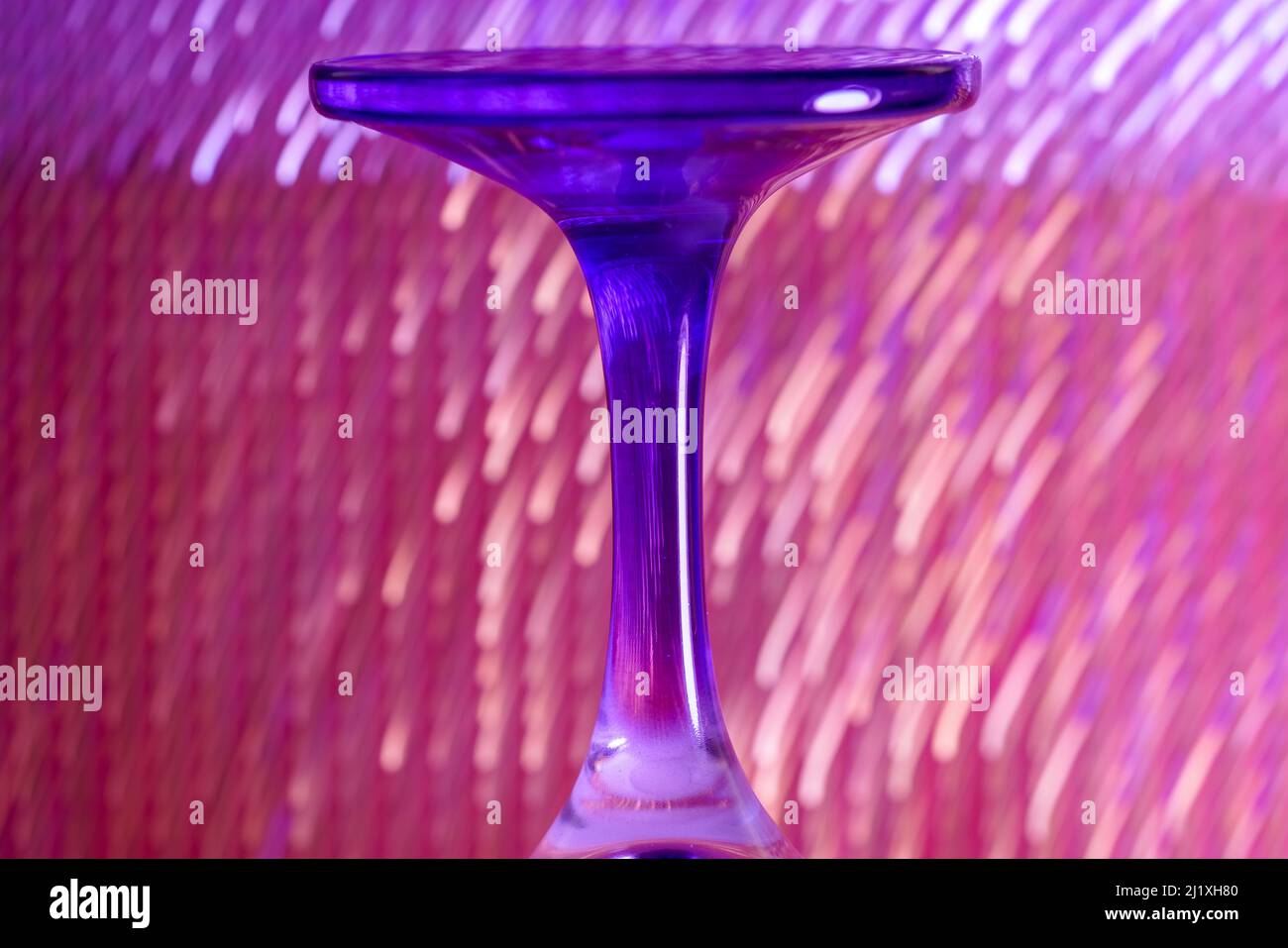 Glass lit from below with colored light creates consuming patterns to ...
