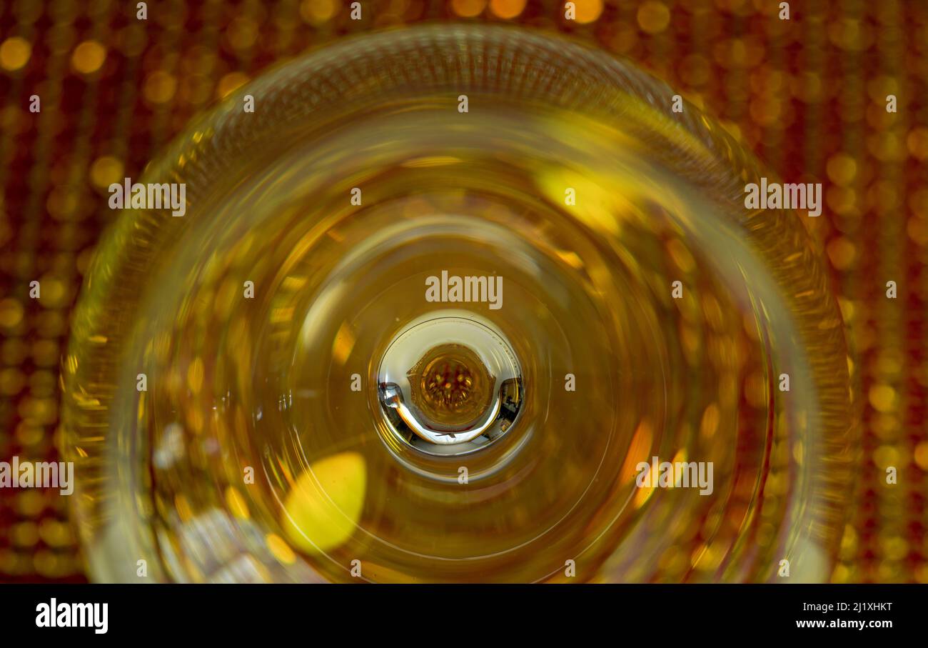 Glass lit from below with colored light creates consuming patterns to ...