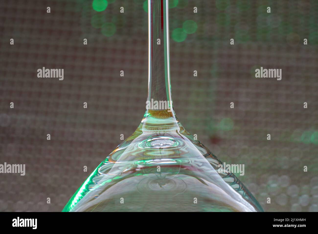 Glass lit from below with colored light creates consuming patterns to ...