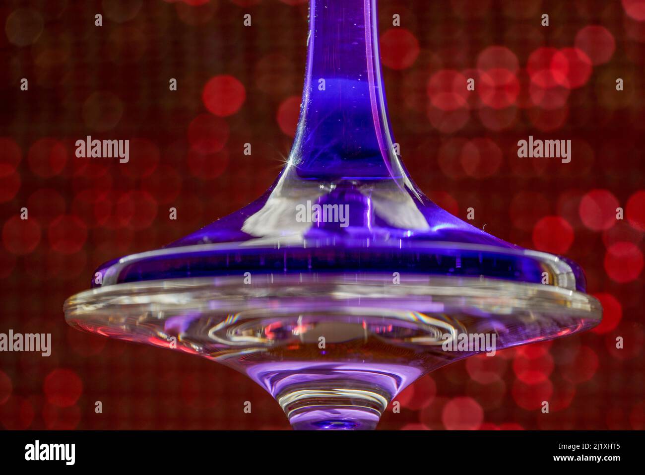 Glass lit from below with colored light creates consuming patterns to ...