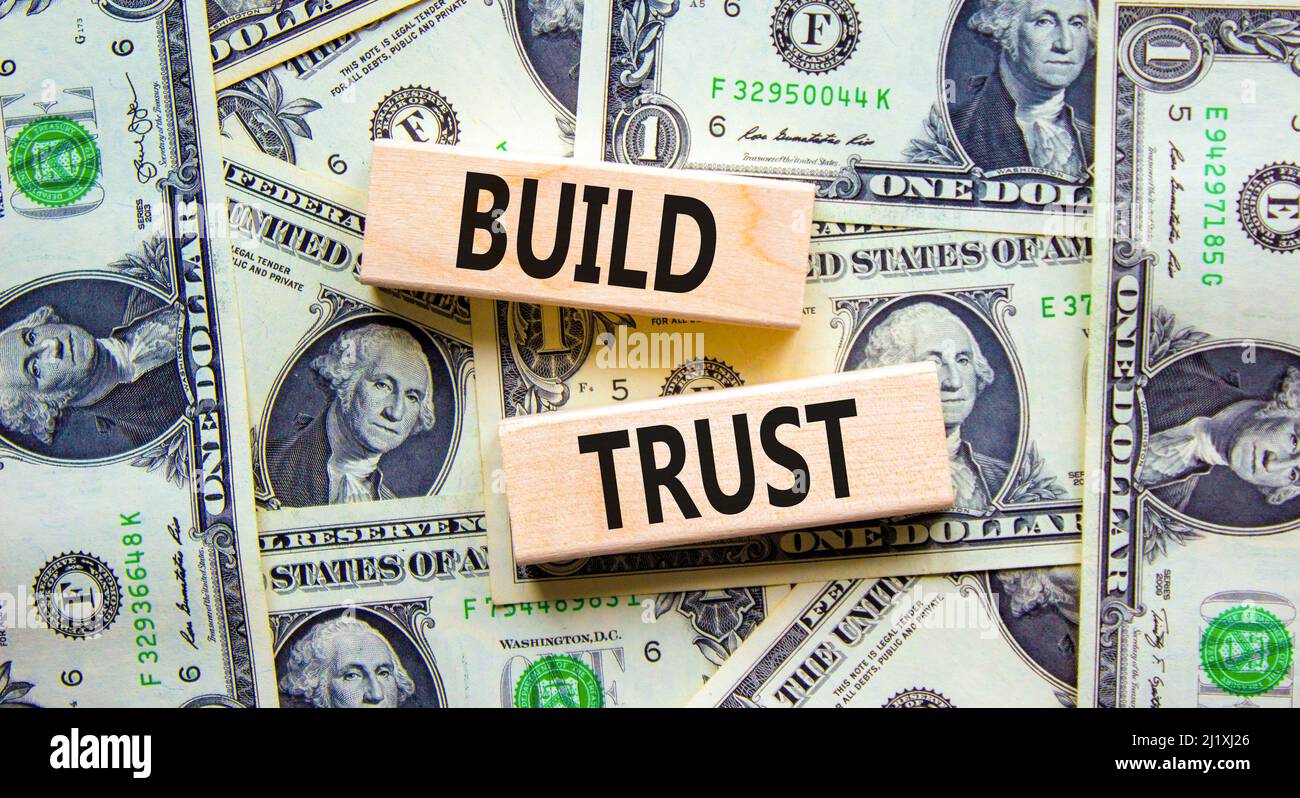 Build trust symbol. Concept words Build trust on wooden blocks on a ...
