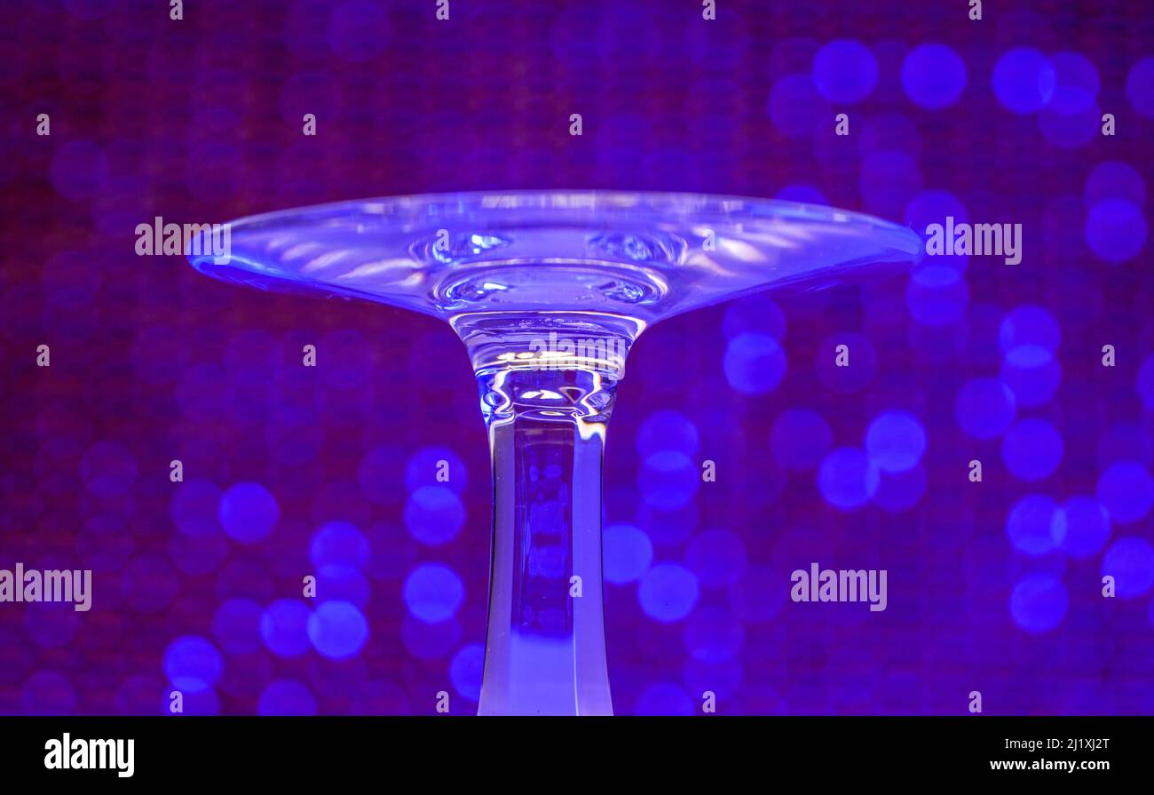 Glass lit from below with colored light creates consuming patterns to ...